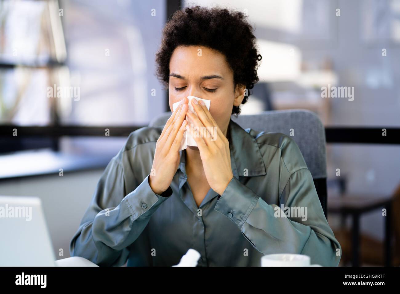 Sick Office Employee Sneeze At Work. Flu Or Allergy Stock Photo - Alamy
