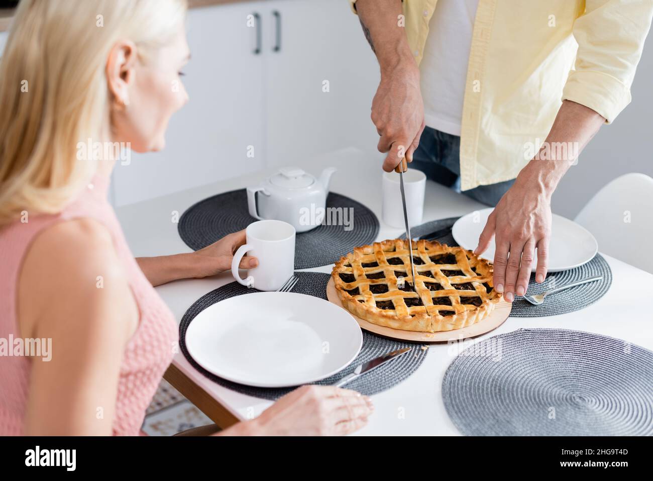 Woman cutting pie man hi-res stock photography and images - Alamy