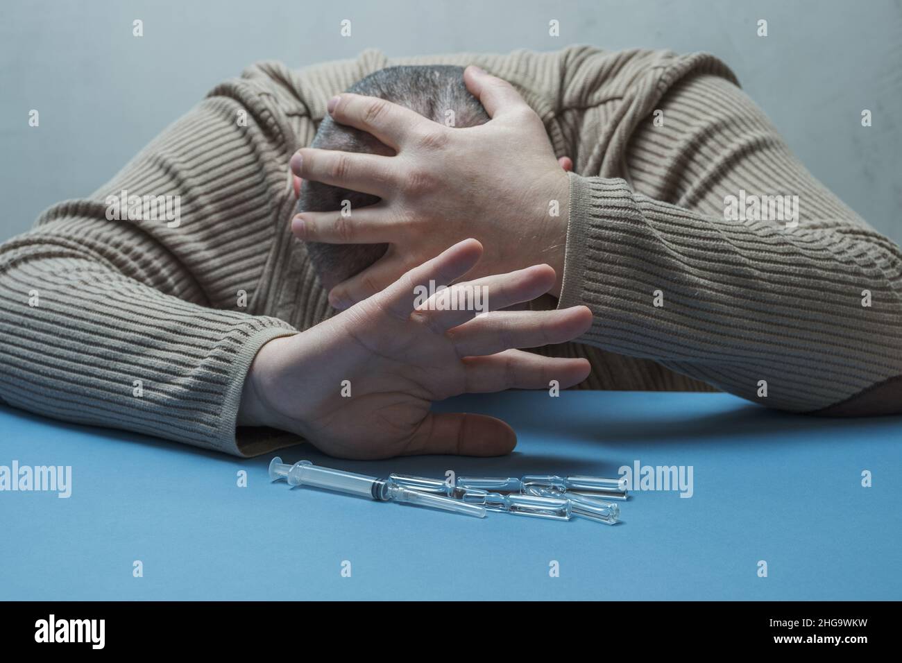 The man refuses medical preparations with a gesture Stock Photo - Alamy