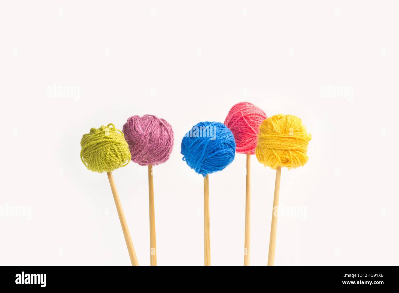 Crochet needles on white background Cut Out Stock Images & Pictures - Alamy