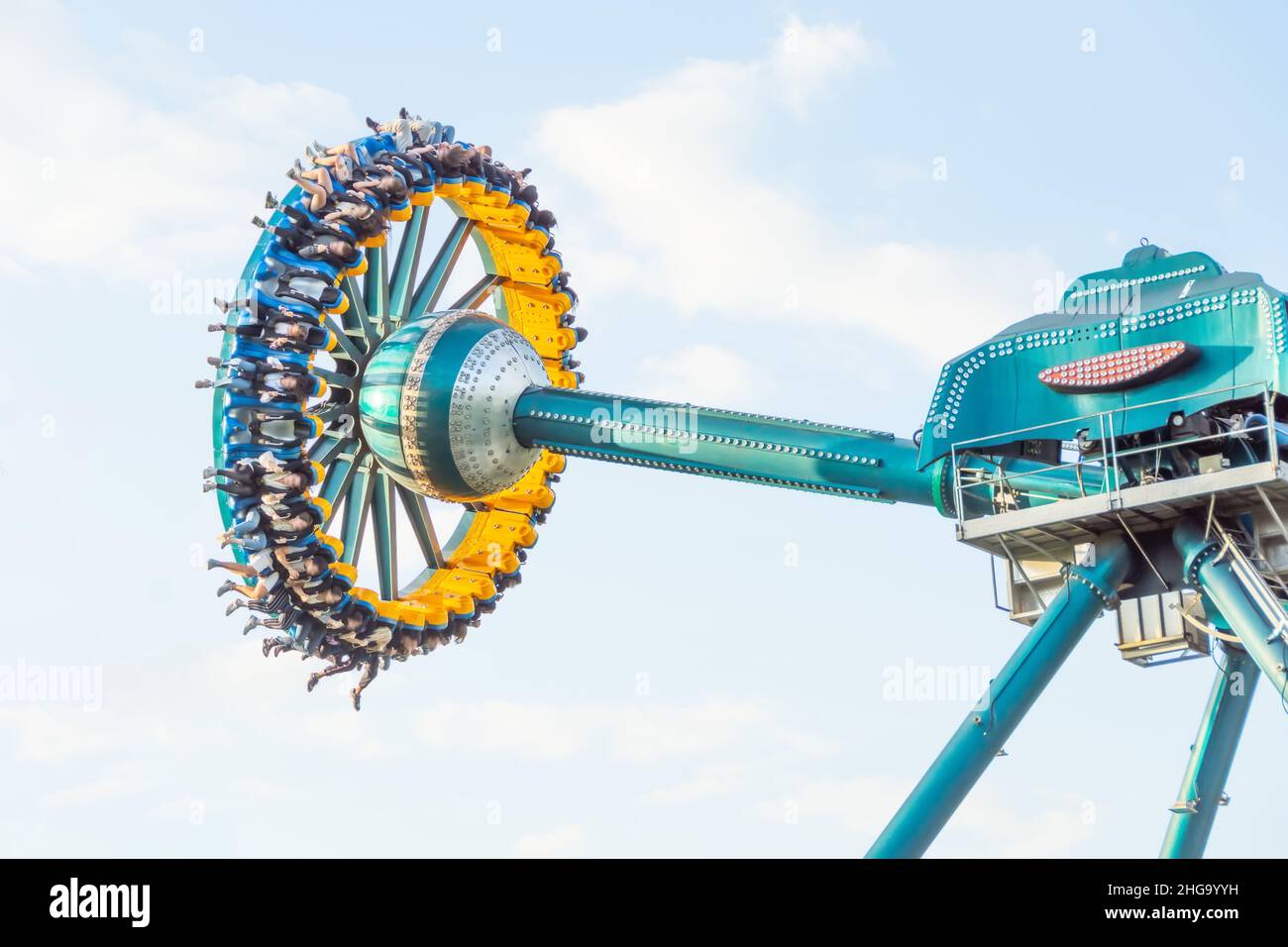 Attraction with a rotating seat, swings extremely to the sides Stock ...