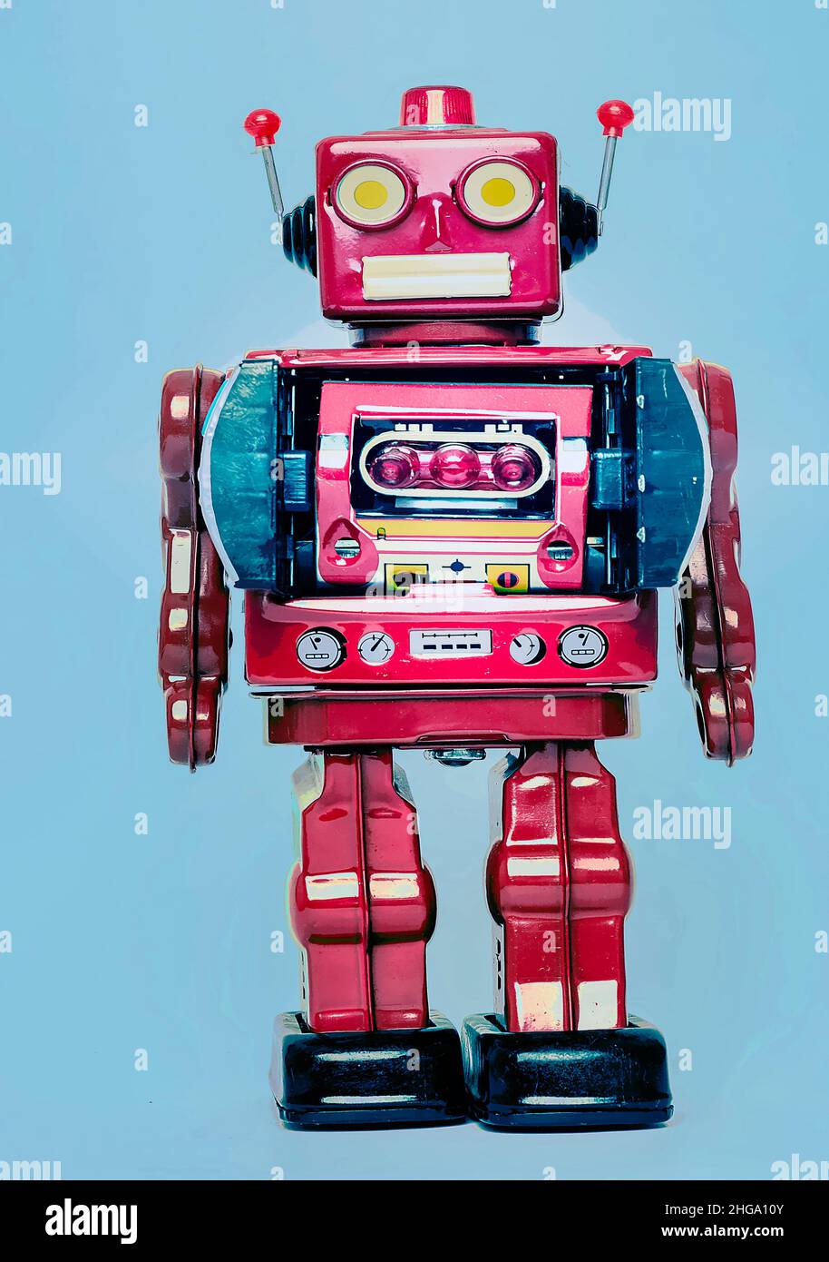 big retro red robot with light blue background Stock Photo - Alamy
