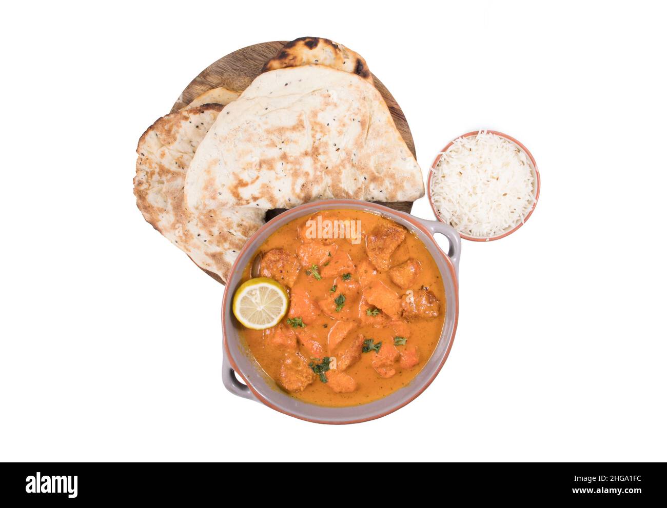 butter chicken isolated on a white background Stock Photo - Alamy