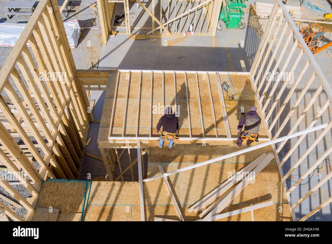 Beam stick built frame of new house under construction Stock Photo - Alamy
