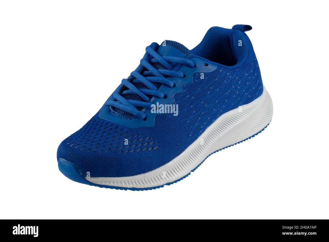 Blue sneaker made of fabric with a white sole on a white background ...