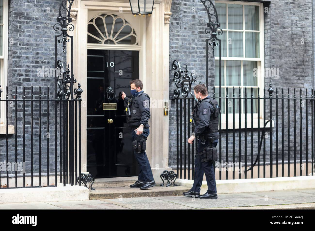 Members of the British Police seen entering No. 10 Downing Street ...