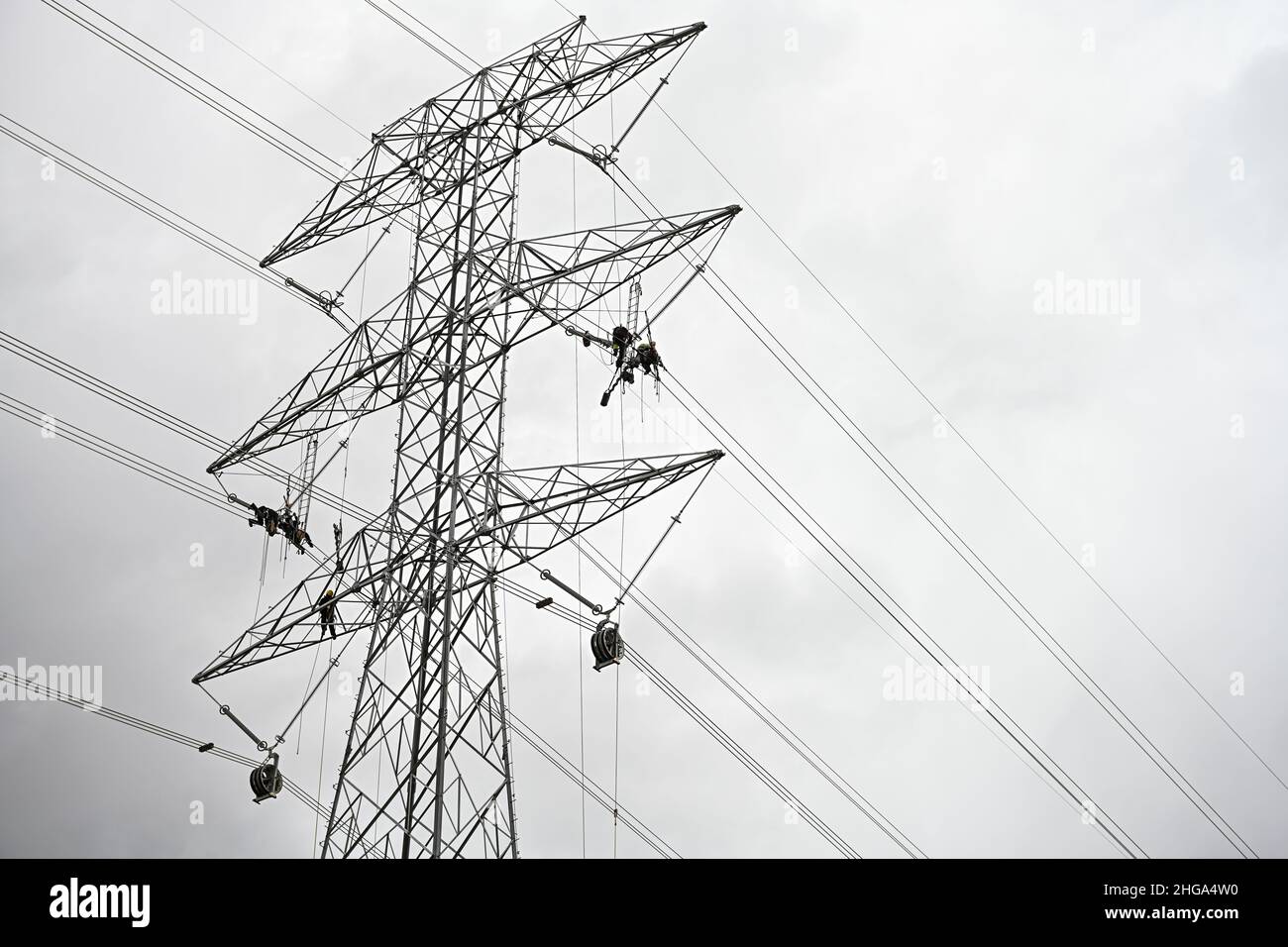 Installation and assembly of high-rise electrical towers Stock Photo ...