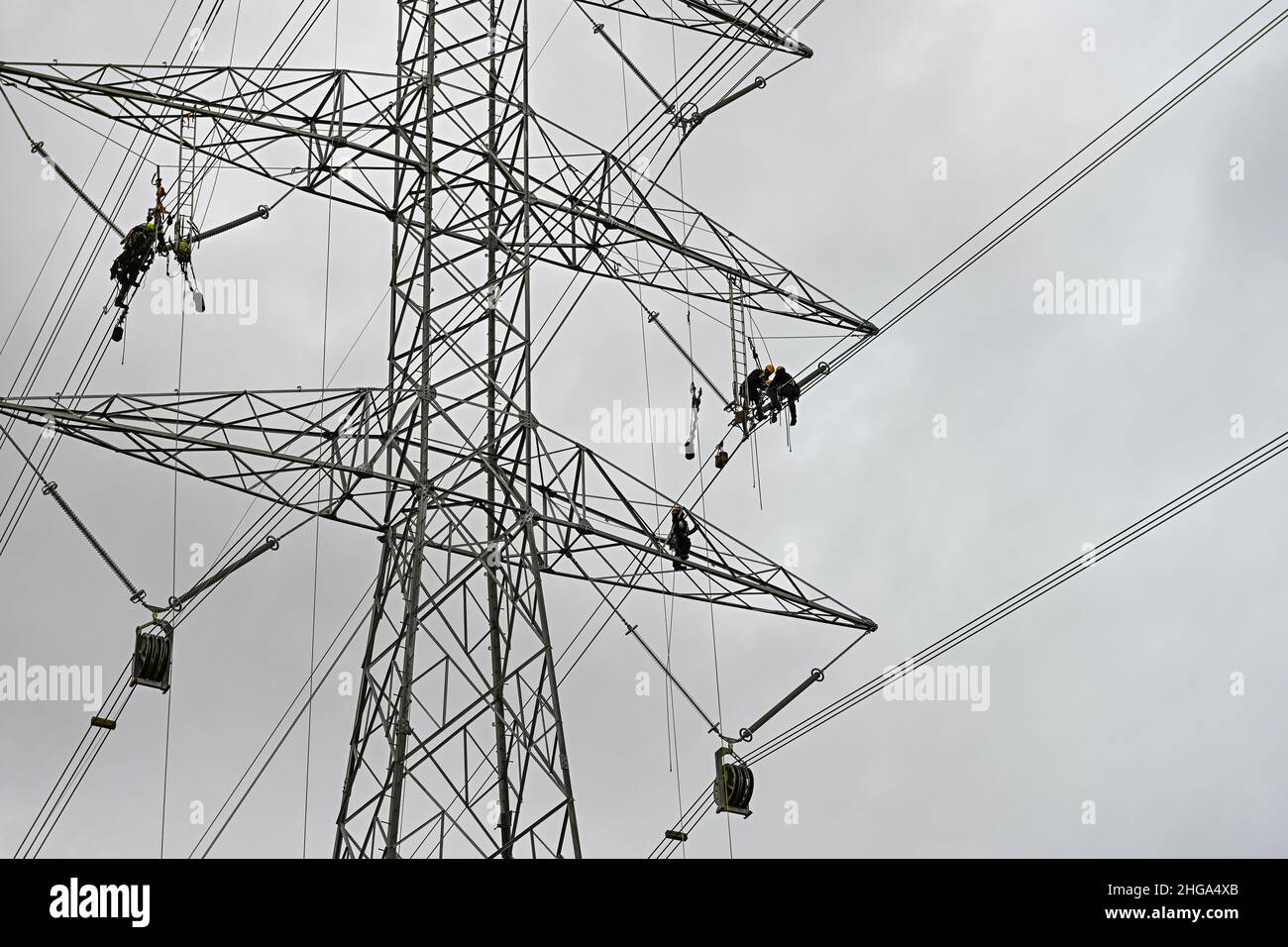 Installation and assembly of high-rise electrical towers Stock Photo ...