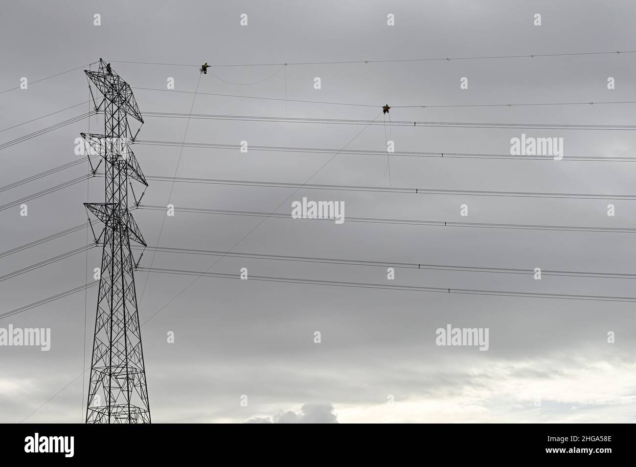 Installation and assembly of high-rise electrical towers Stock Photo ...