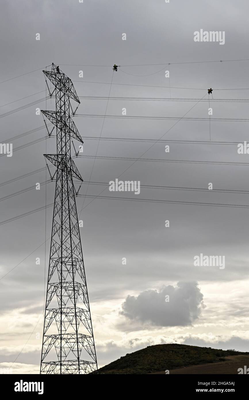 Installation and assembly of high-rise electrical towers Stock Photo ...