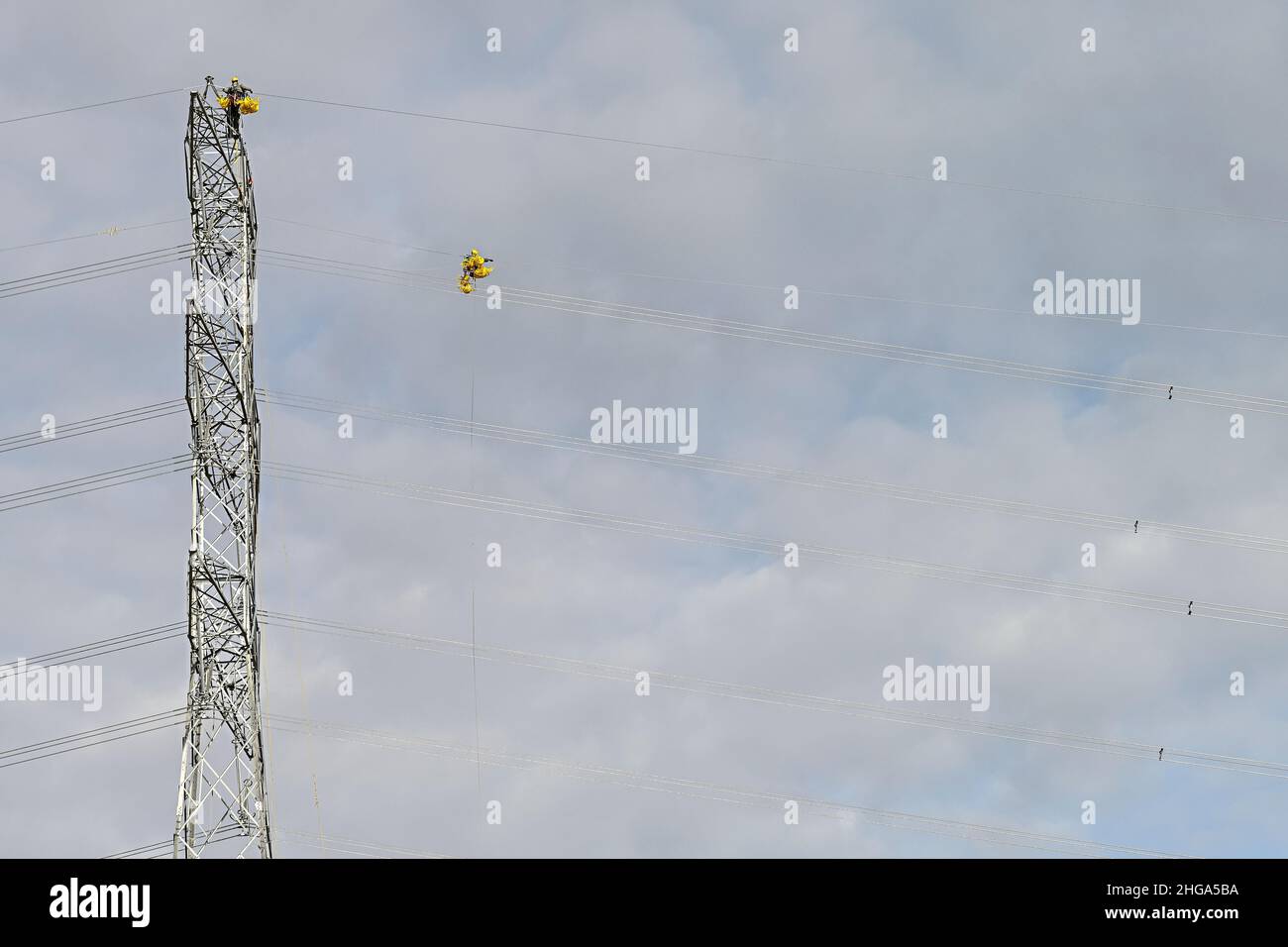 Installation and assembly of high-rise electrical towers Stock Photo ...