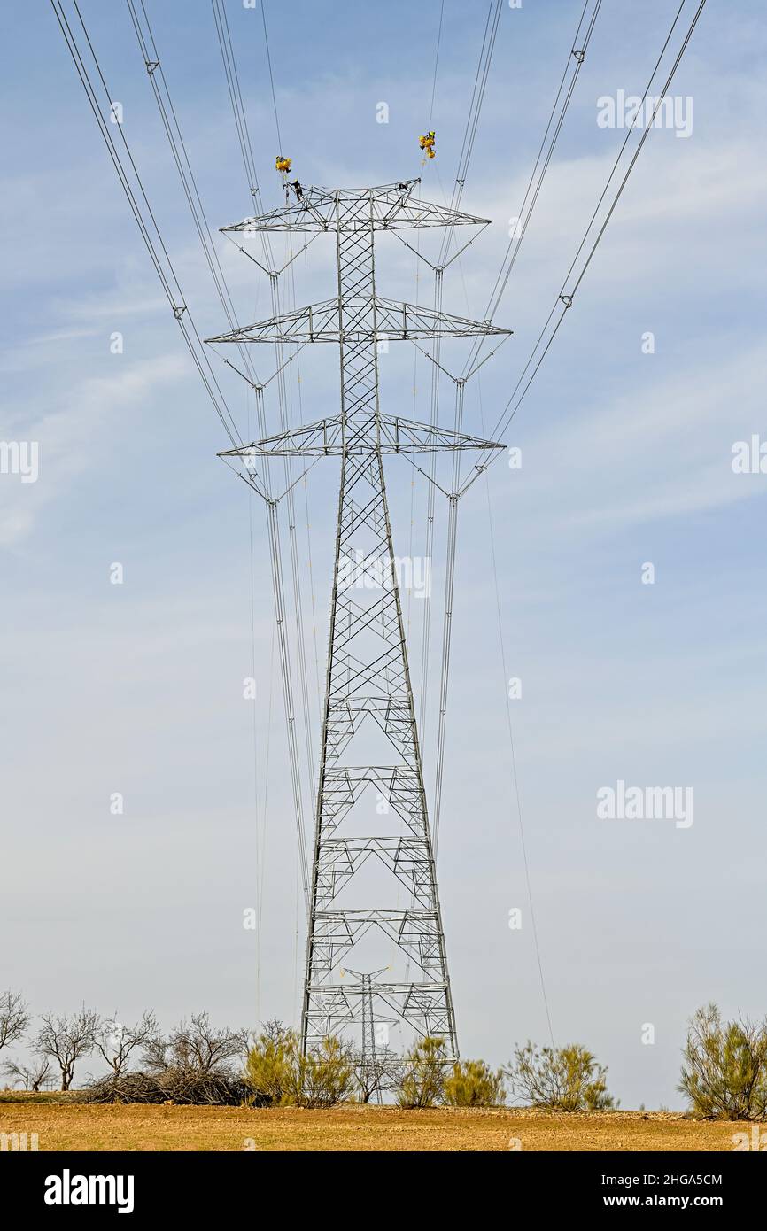 Installation and assembly of high-rise electrical towers Stock Photo ...