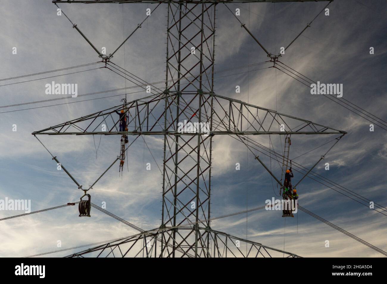 Installation and assembly of high-rise electrical towers Stock Photo ...