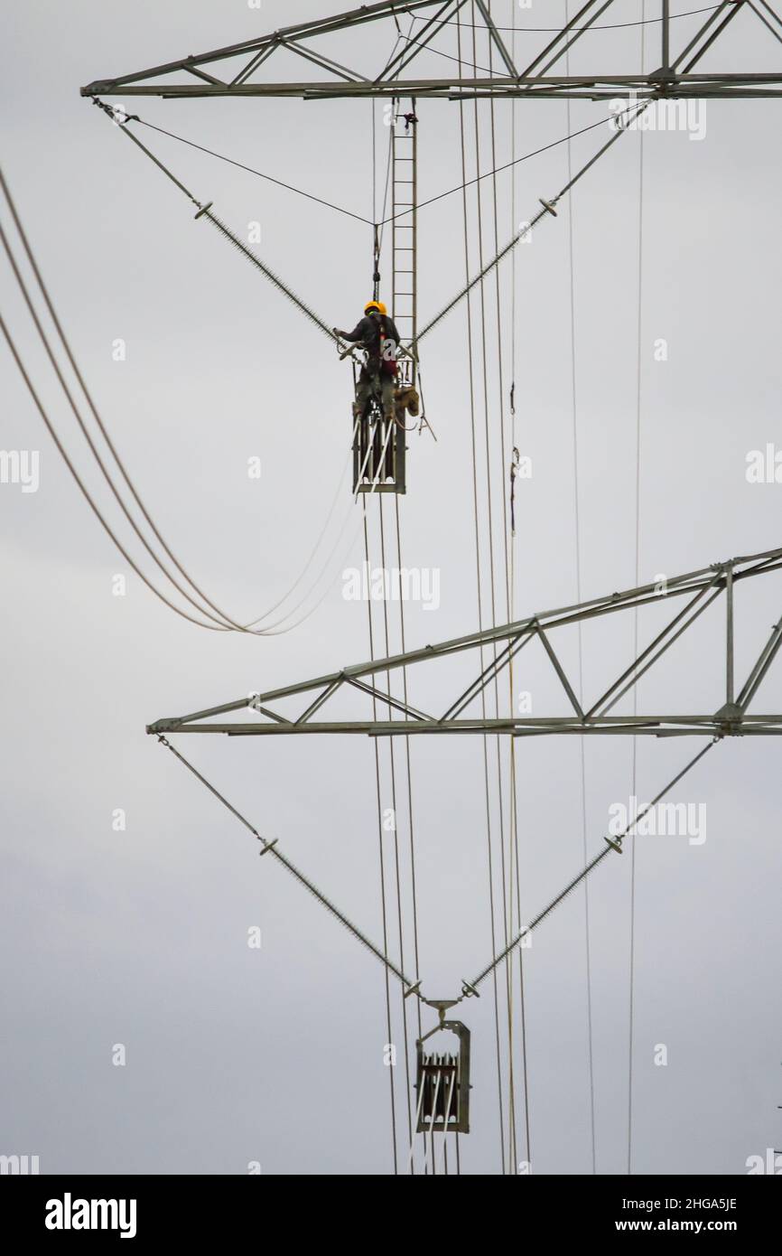 Installation and assembly of high-rise electrical towers Stock Photo ...