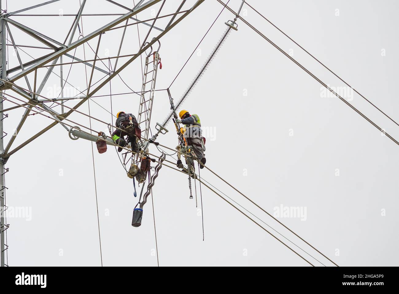 Installation and assembly of high-rise electrical towers Stock Photo ...