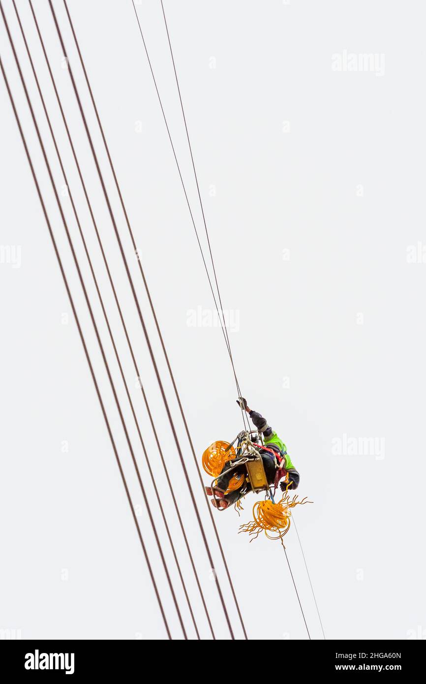 Installation and assembly of high-rise electrical towers Stock Photo ...