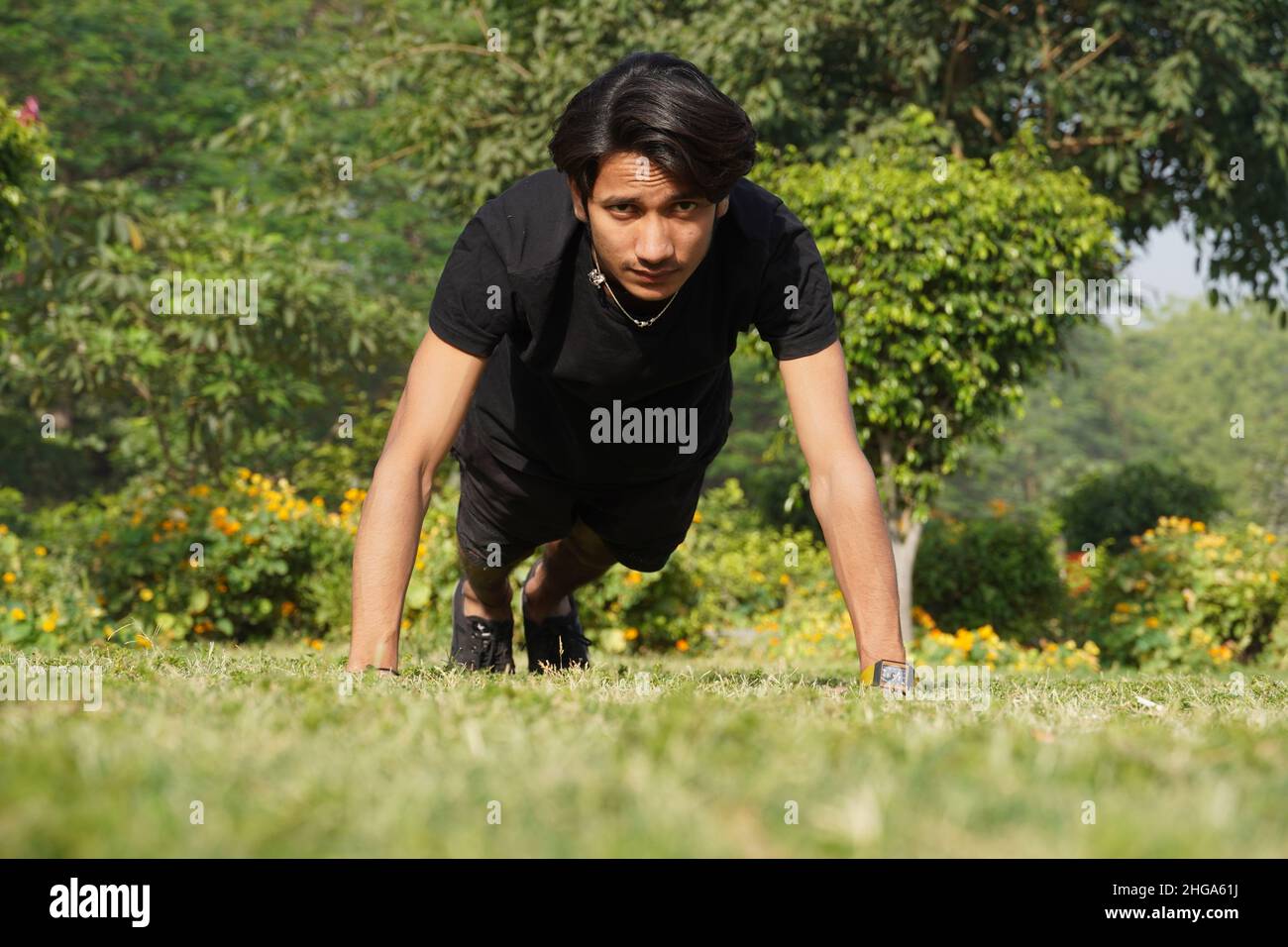 Boy doing yoga pose in hi-res stock photography and images - Alamy