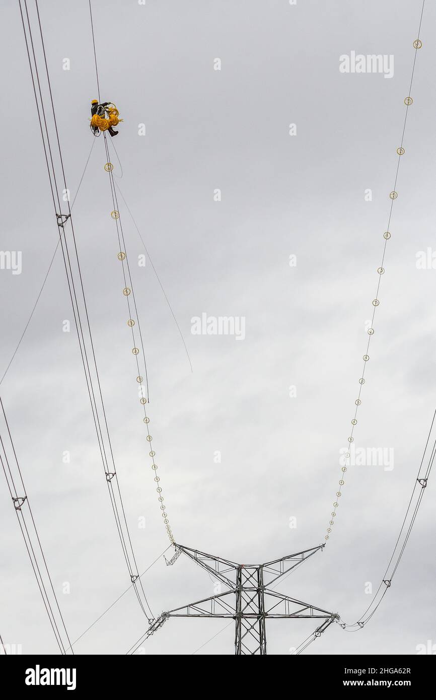 Installation and assembly of high-rise electrical towers Stock Photo ...