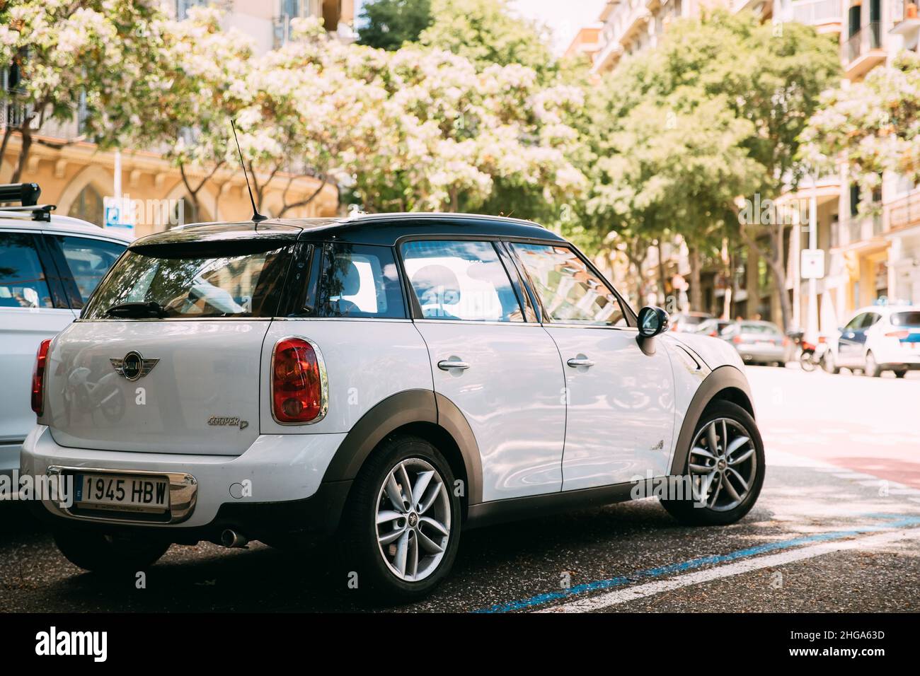 White Color Mini Cooper All 4 Car Parking In Street Stock Photo - Alamy