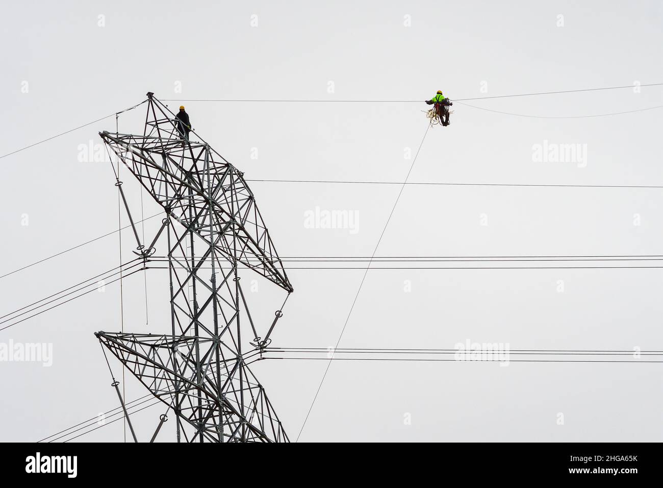 Installation and assembly of high-rise electrical towers Stock Photo ...