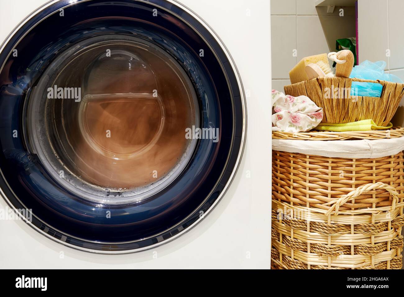 The washing machine washes things in the home laundry. Home interior ...