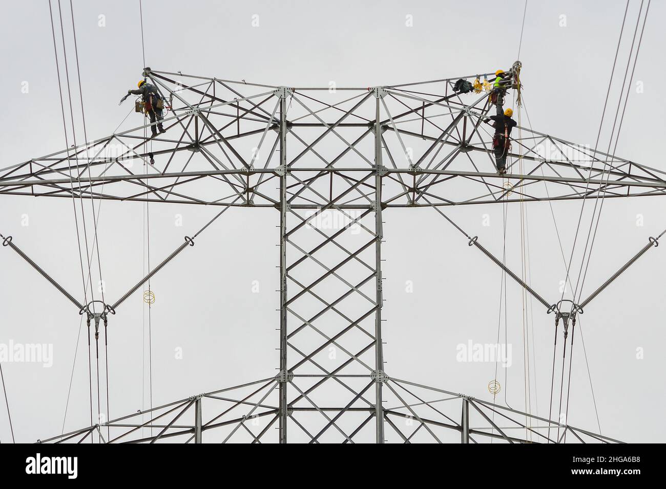 Installation and assembly of high-rise electrical towers Stock Photo ...