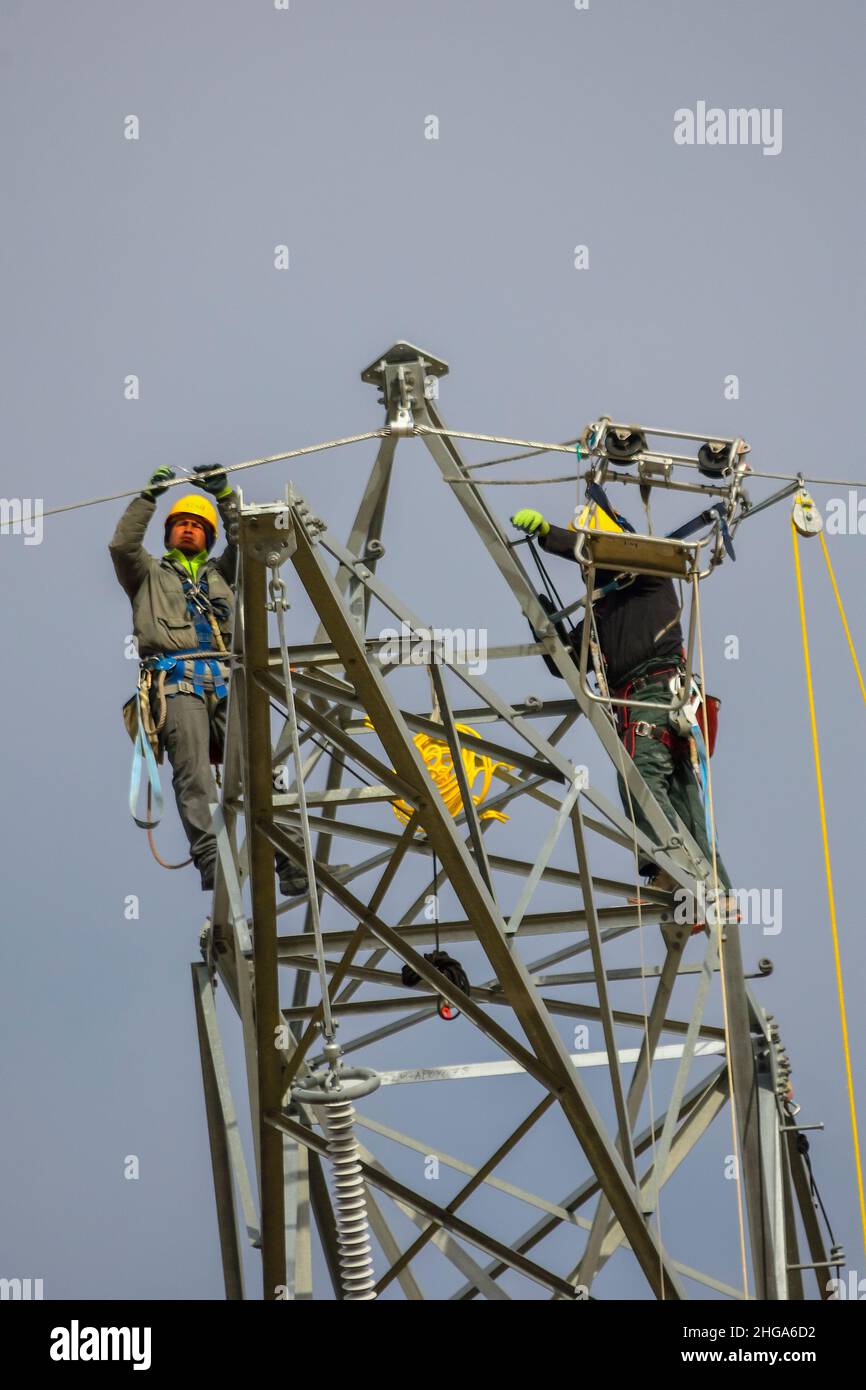 Installation and assembly of high-rise electrical towers Stock Photo ...