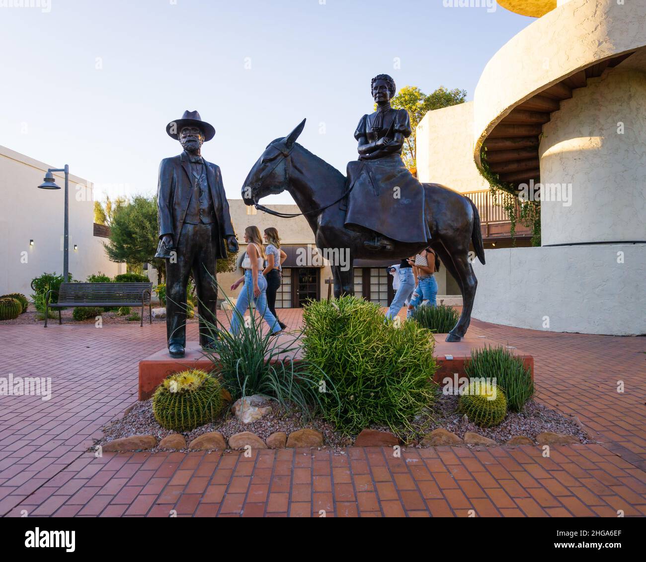 Women walking behind the Winfield Scott Memorial bronze sculpture at ...