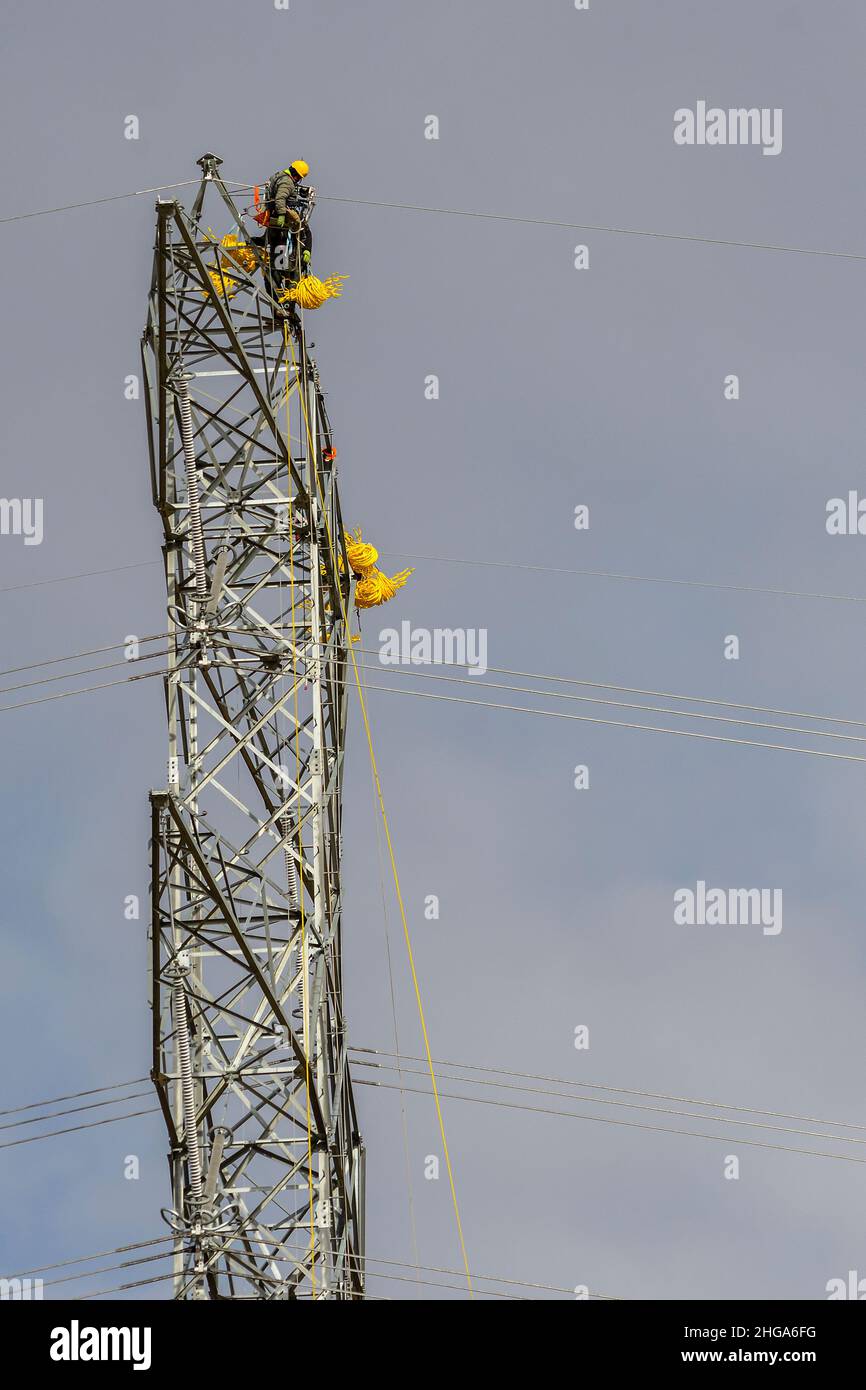 Installation and assembly of high-rise electrical towers Stock Photo ...