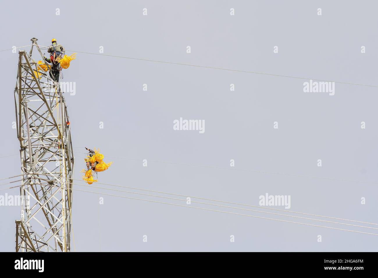 Installation and assembly of high-rise electrical towers Stock Photo ...