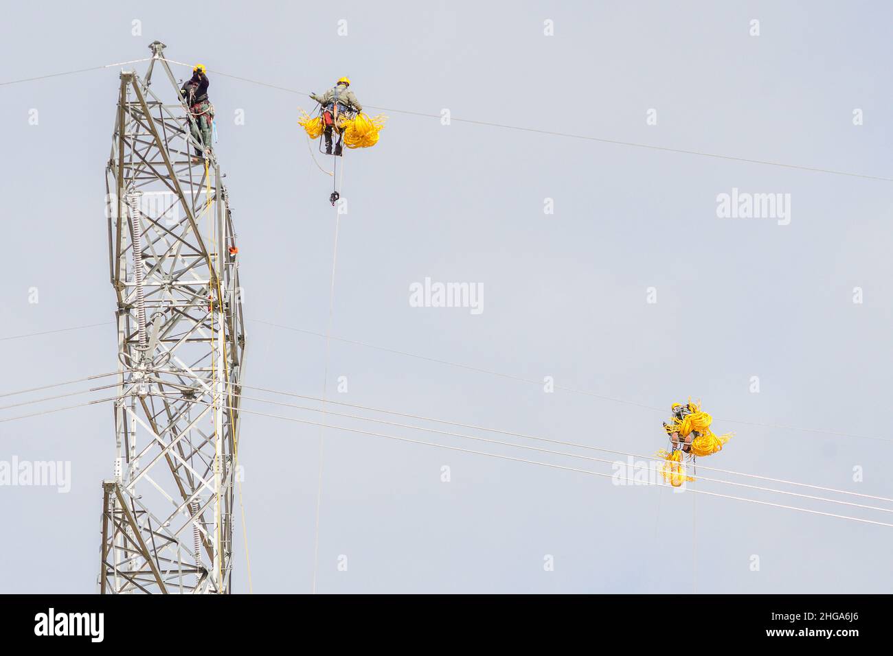 Installation and assembly of high-rise electrical towers Stock Photo ...