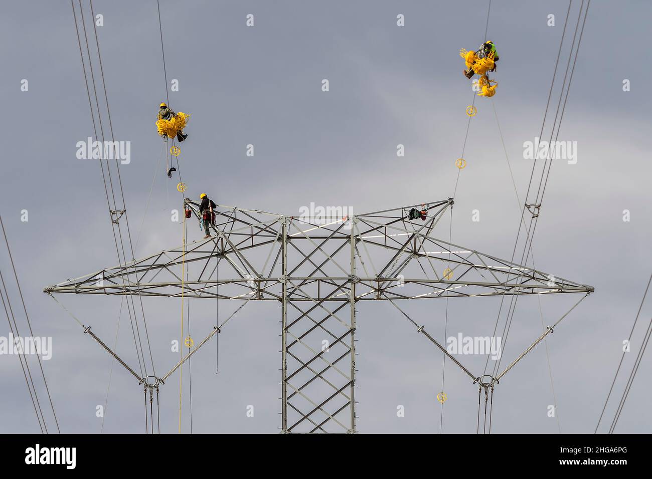 Installation and assembly of high-rise electrical towers Stock Photo ...