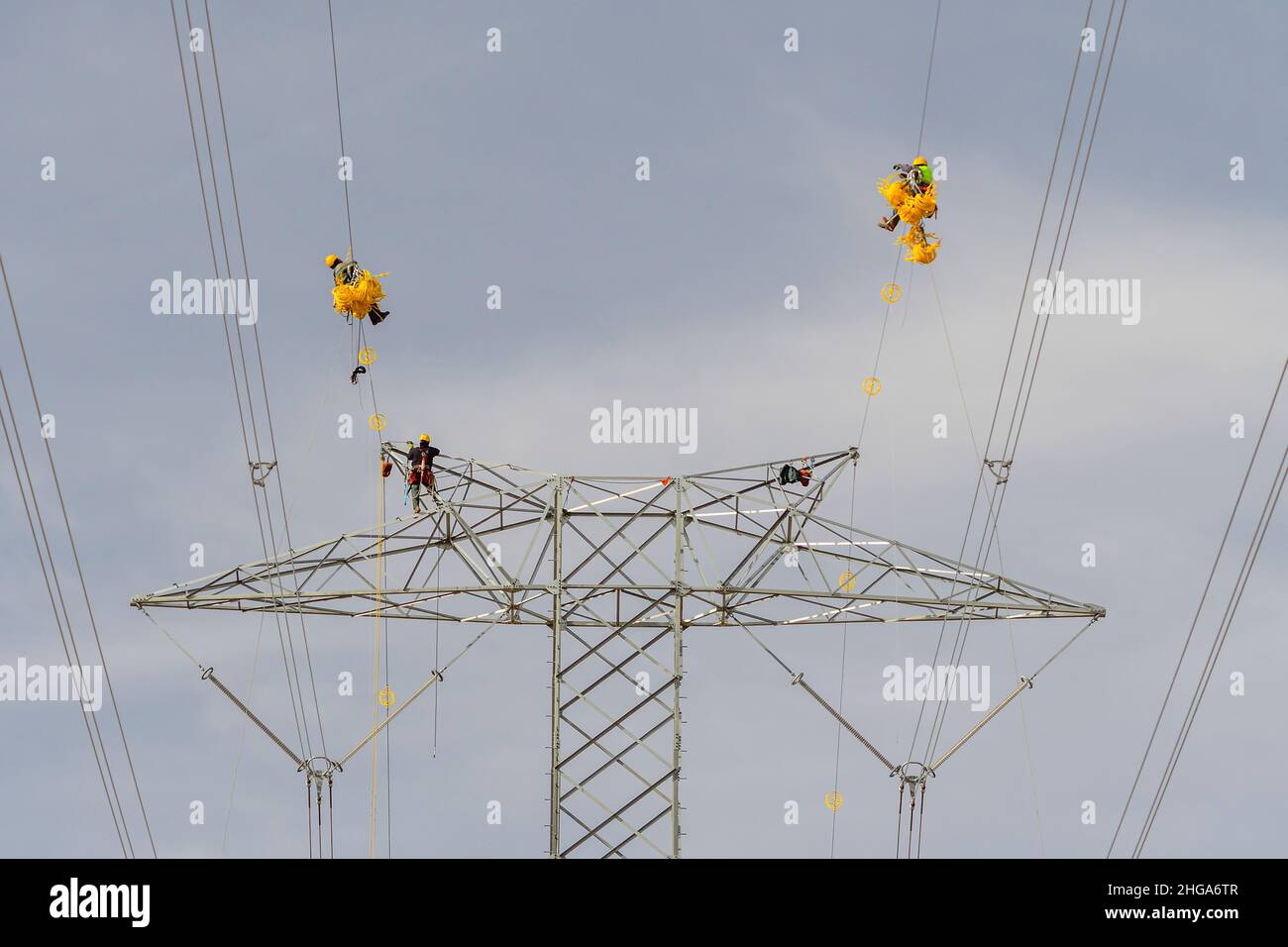 Installation and assembly of high-rise electrical towers Stock Photo ...
