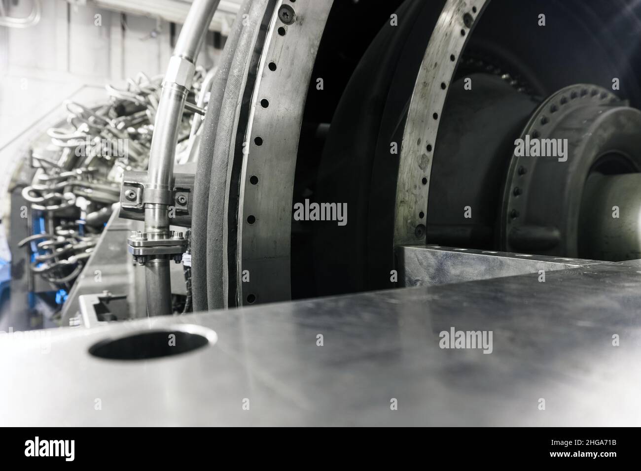 The rotor of a gas turbine compressor with a bolted coupling half ...