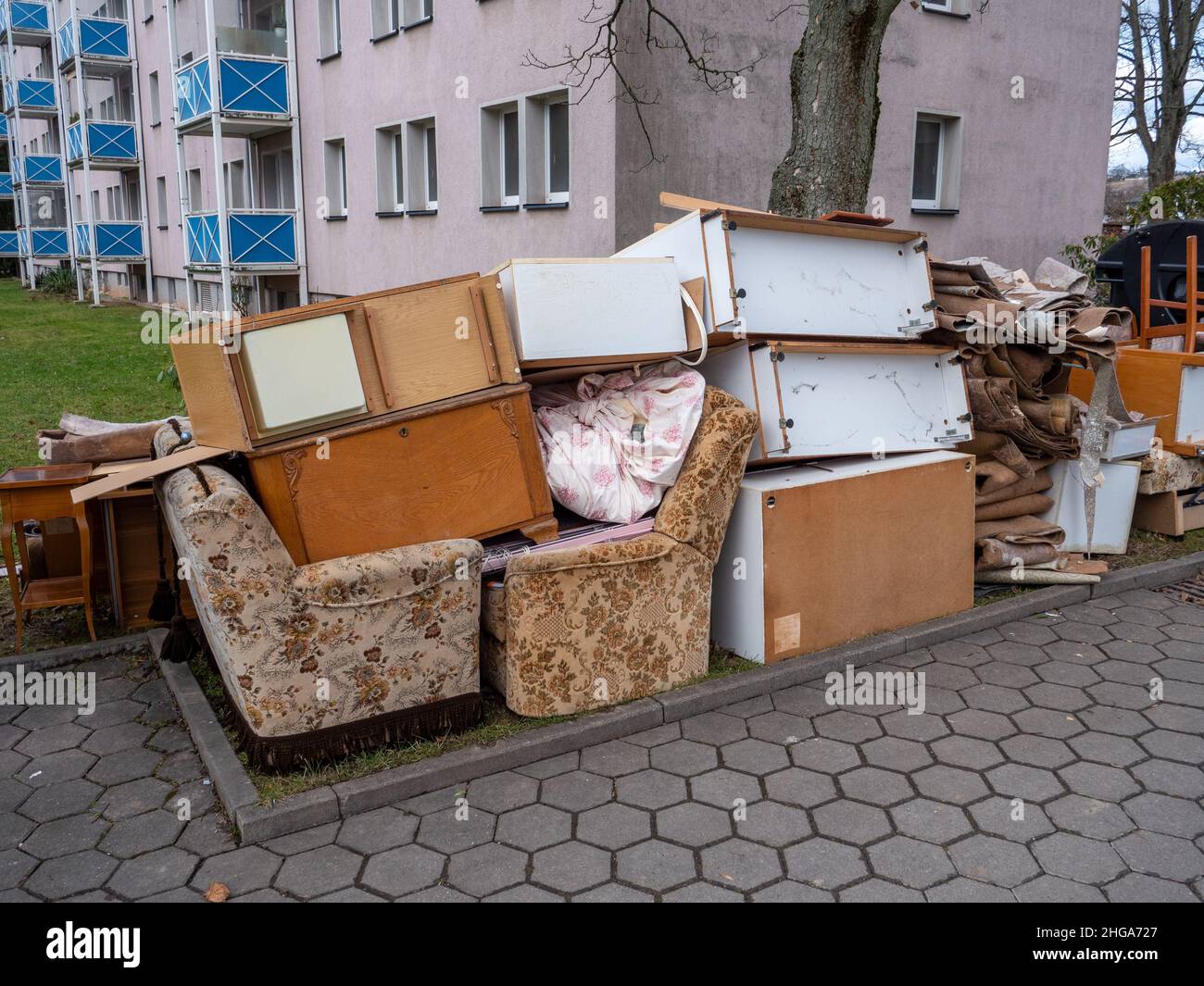 bulky waste to the recycling yard on the roadside Stock Photo - Alamy