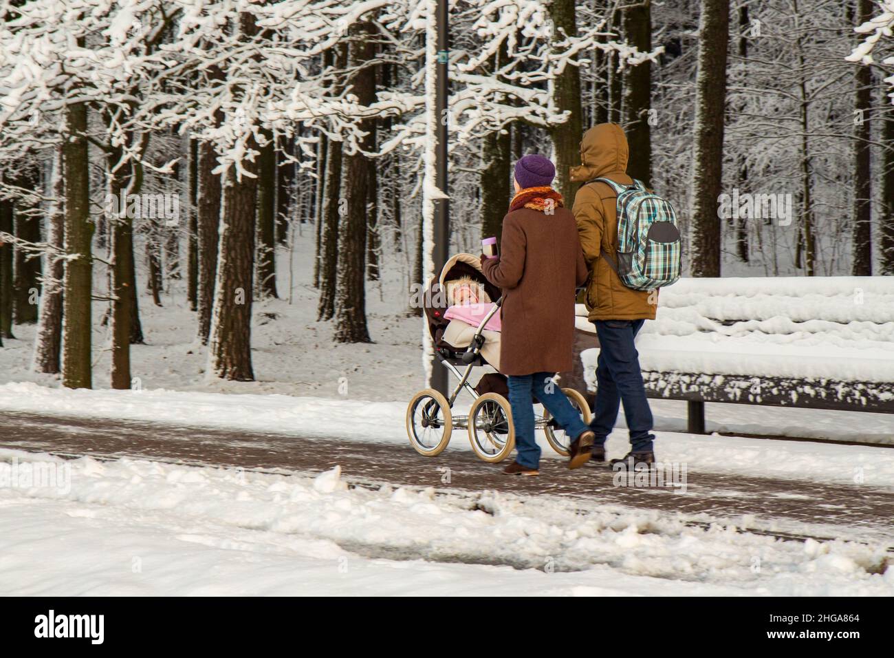 Parents Pushing Baby Stroller High Resolution Stock Photography and ...