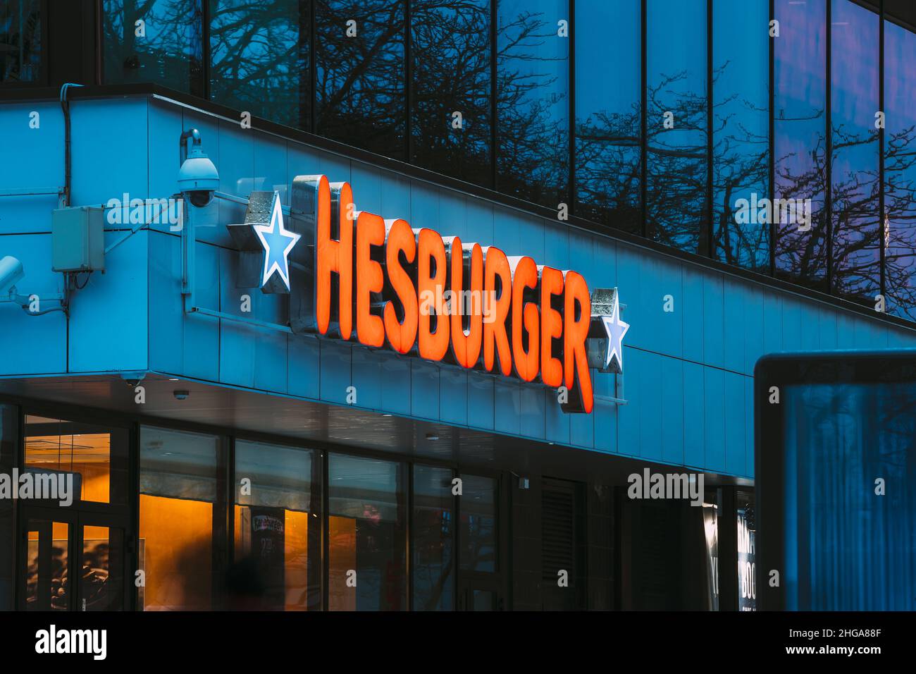 Logo Sign Brand of Hesburger On Wall Of Fast Food Restaurant Stock ...