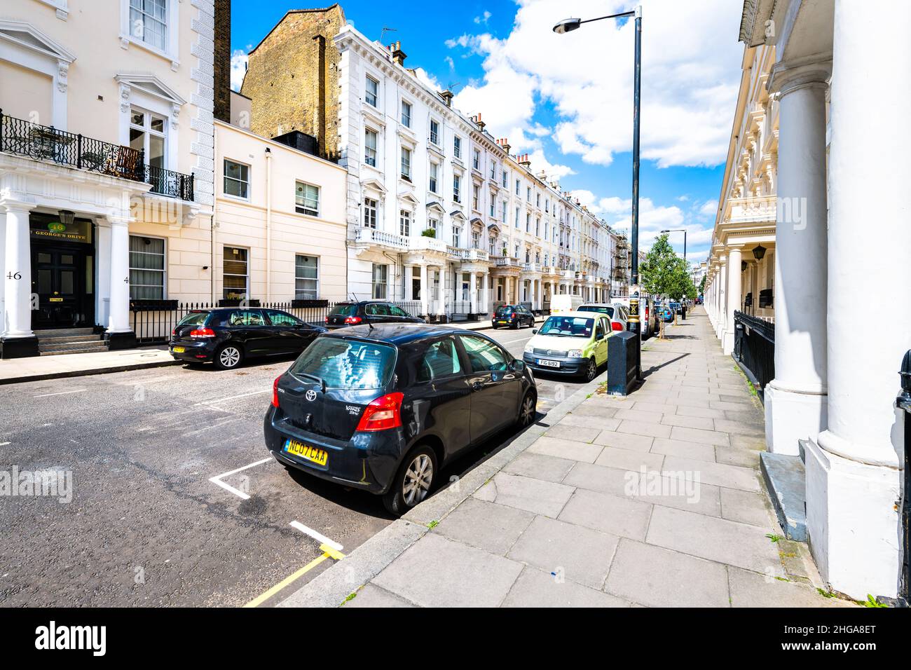 London, UK - June 21, 2018: St George's drive street parking cars ...