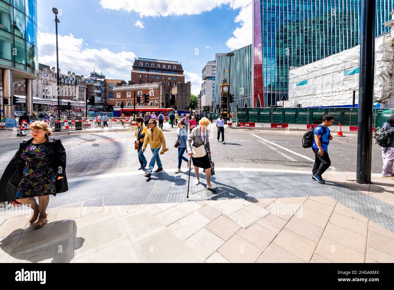 London, UK - June 21, 2018: Many crowd of pedestrians people crossing ...