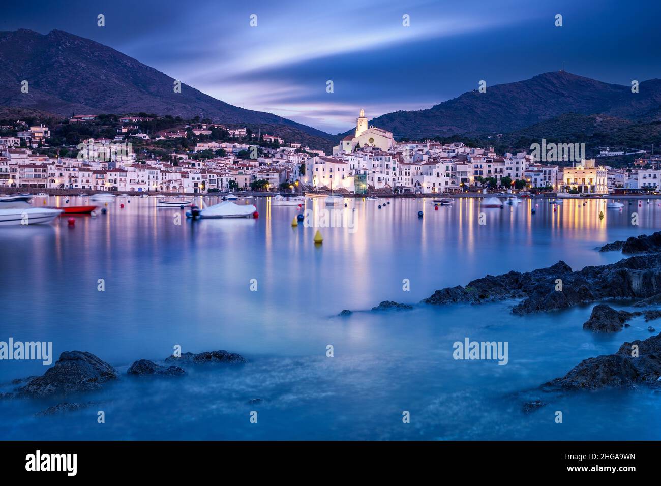 Costal village of Cadaques at sunrise with a long exposure during the ...