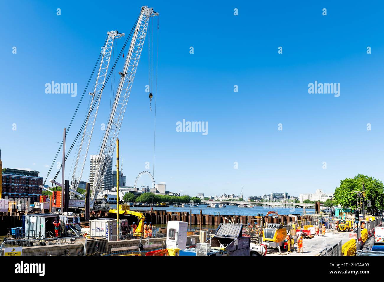London, UK - June 22, 2018: Thames River construction for clean-up with ...