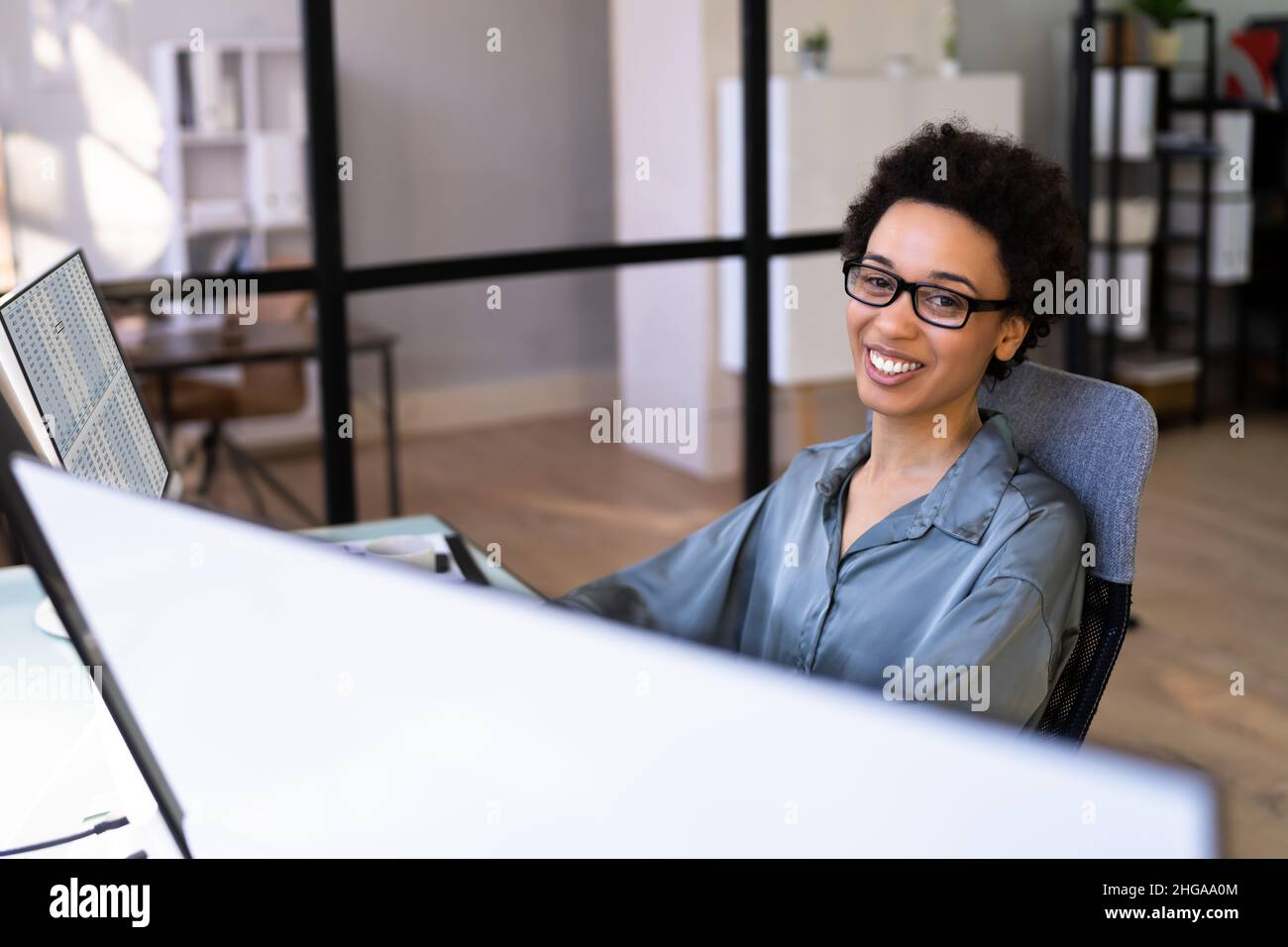 African Woman Staff Using Computer. Business Staff In Office Stock ...