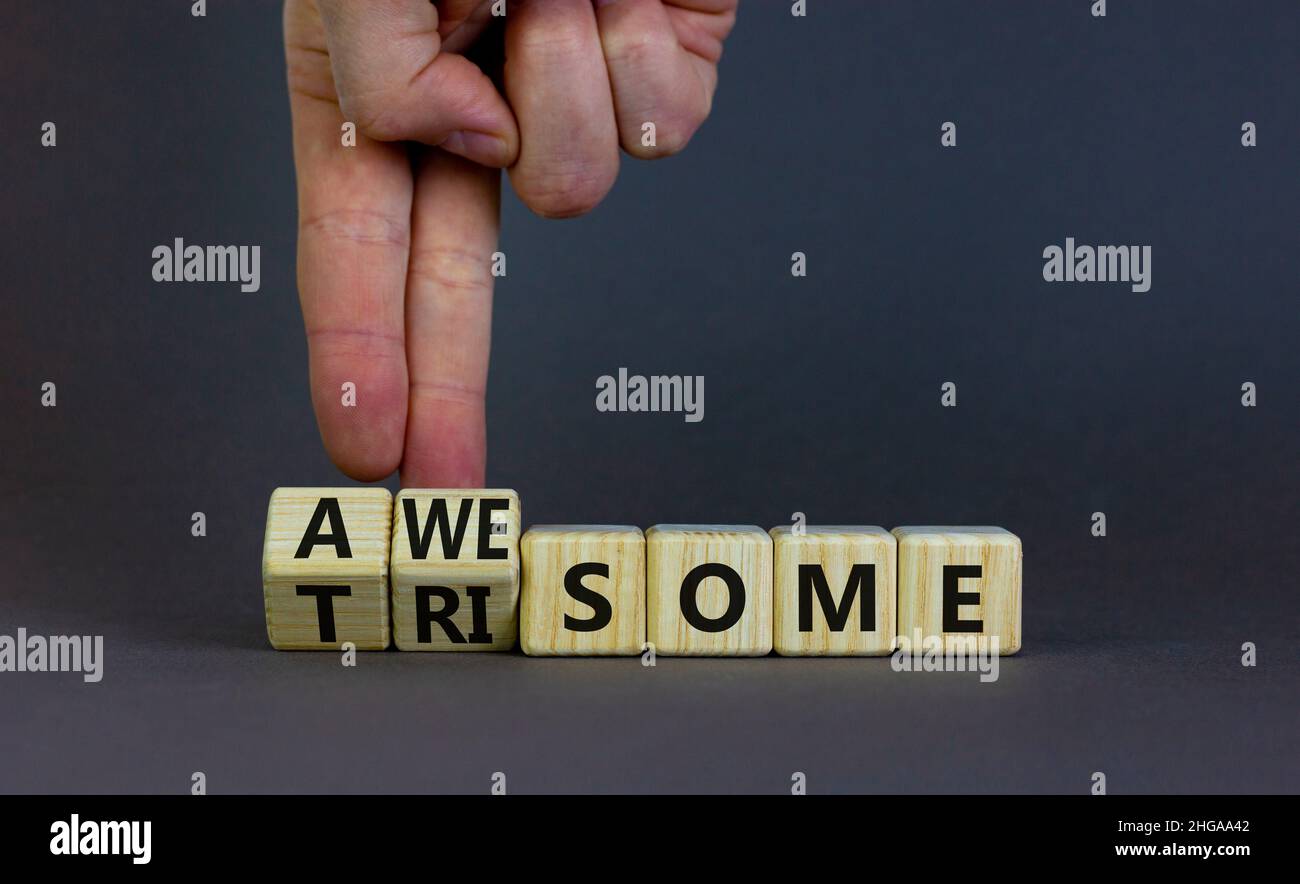 Awesome or trisome symbol. Doctor turns wooden cubes and changes the ...