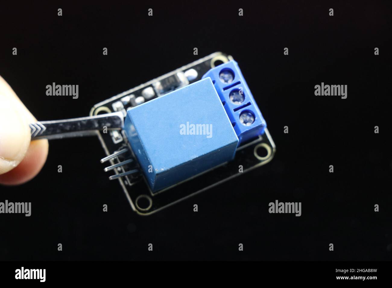 Single channel relay module isolated on black background, Electronic ...