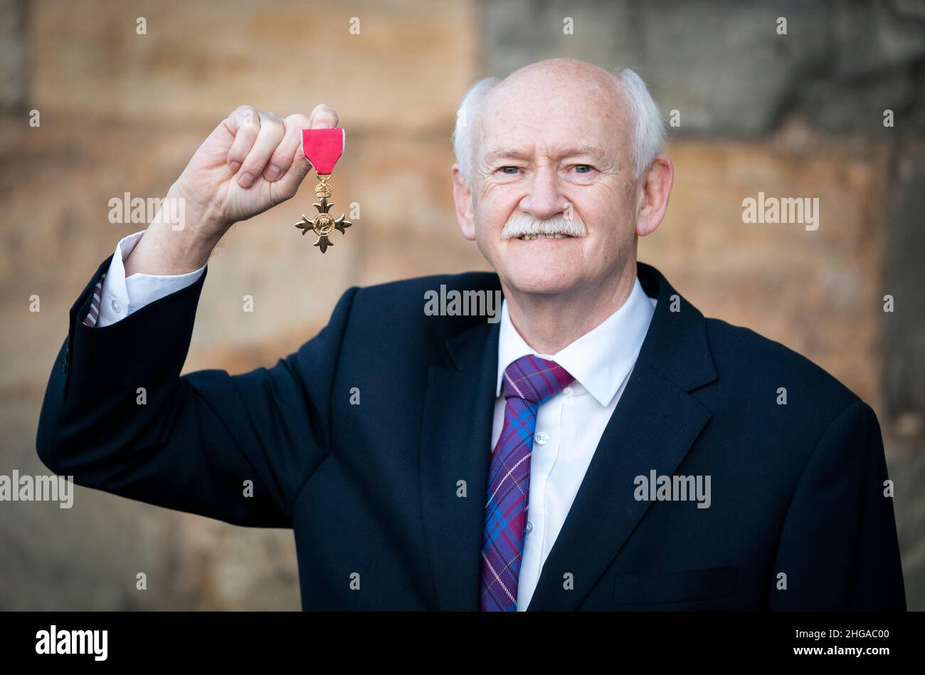 Richard Kenney after receiving his OBE during an Investiture ceremony ...