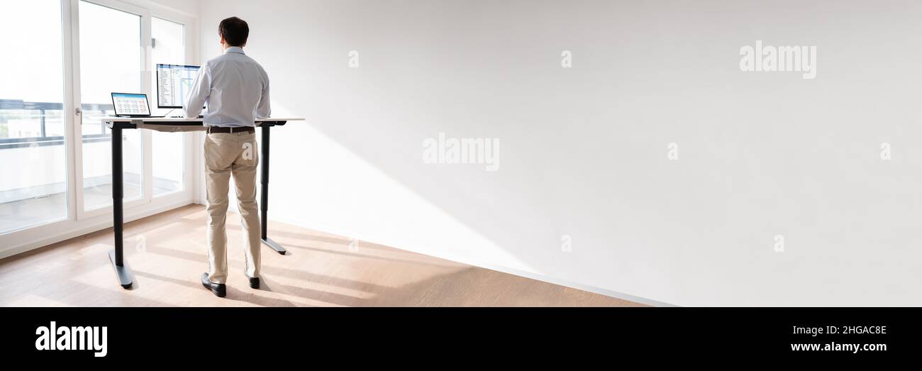 Adjustable Height Desk In Office. Adjusting Stand Posture Stock Photo ...