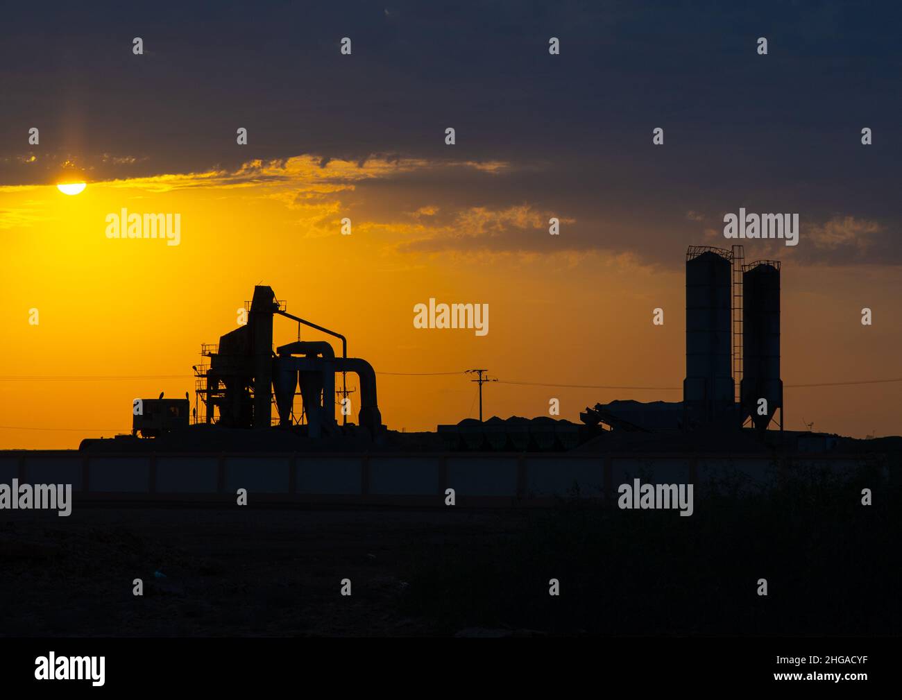Cement factory in the sunset, Jazan Province, Farasan, Saudi Arabia ...