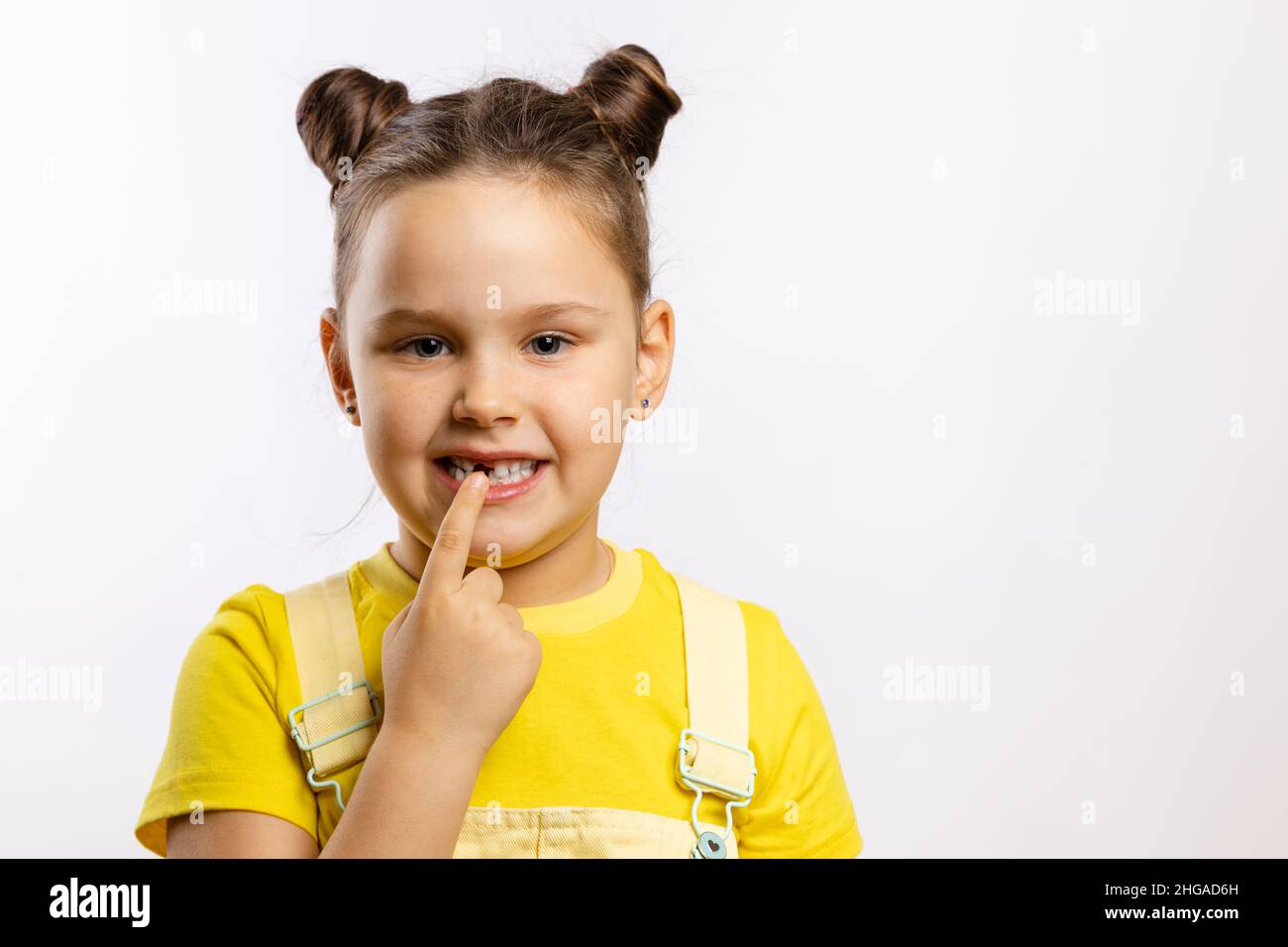 Baby pointing to teeth hi-res stock photography and images - Alamy