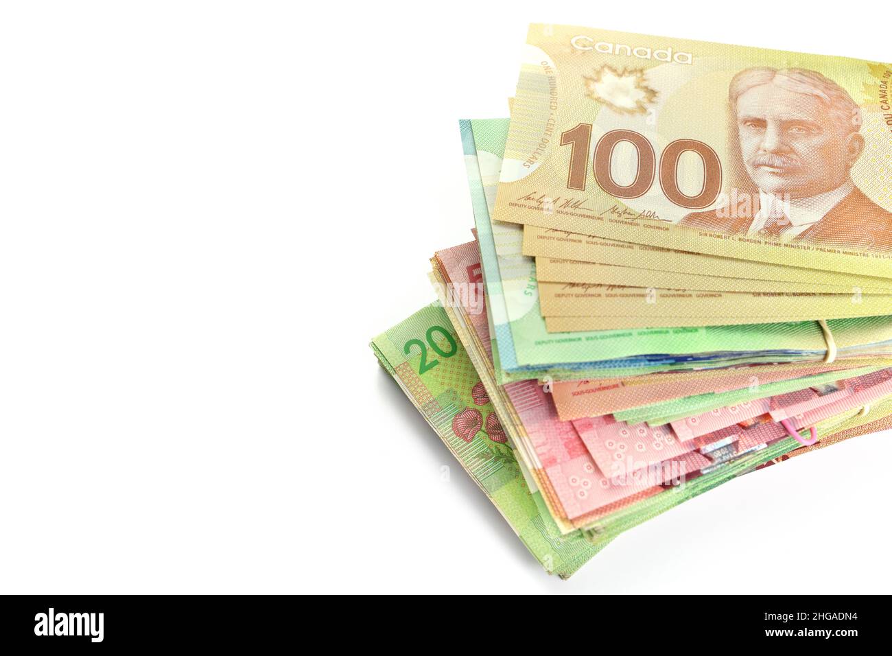 High Angle View of Large Stack of Canadian Banknotes on a White ...