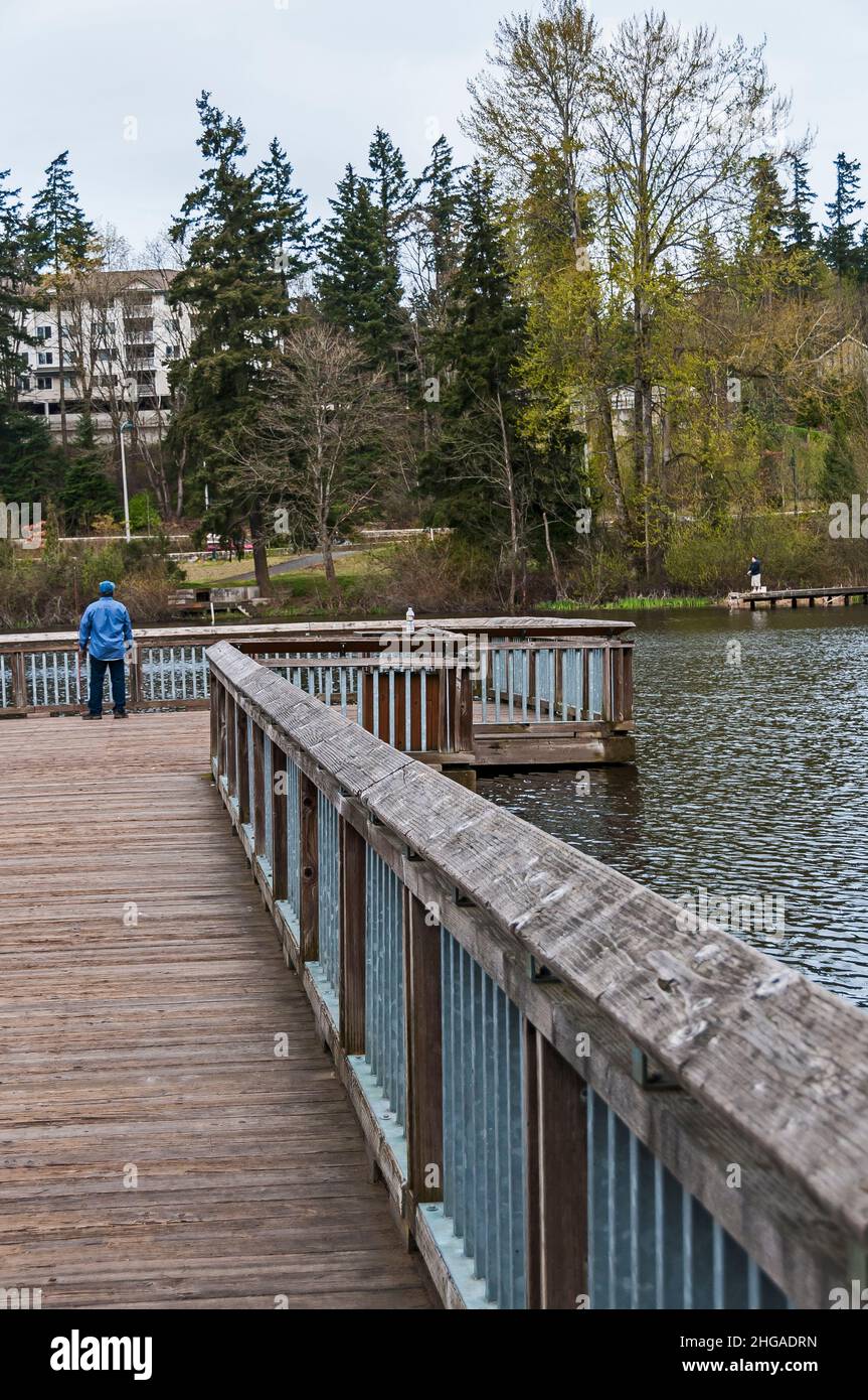 Two men who are fishing at Lake Boren Park Wetlands in Newcastle ...